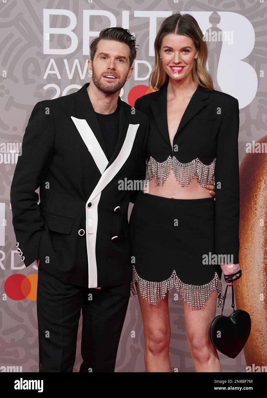 Joe Dommett and Hannah Cooper Dommett attending the Brit Awards 2023 at ...