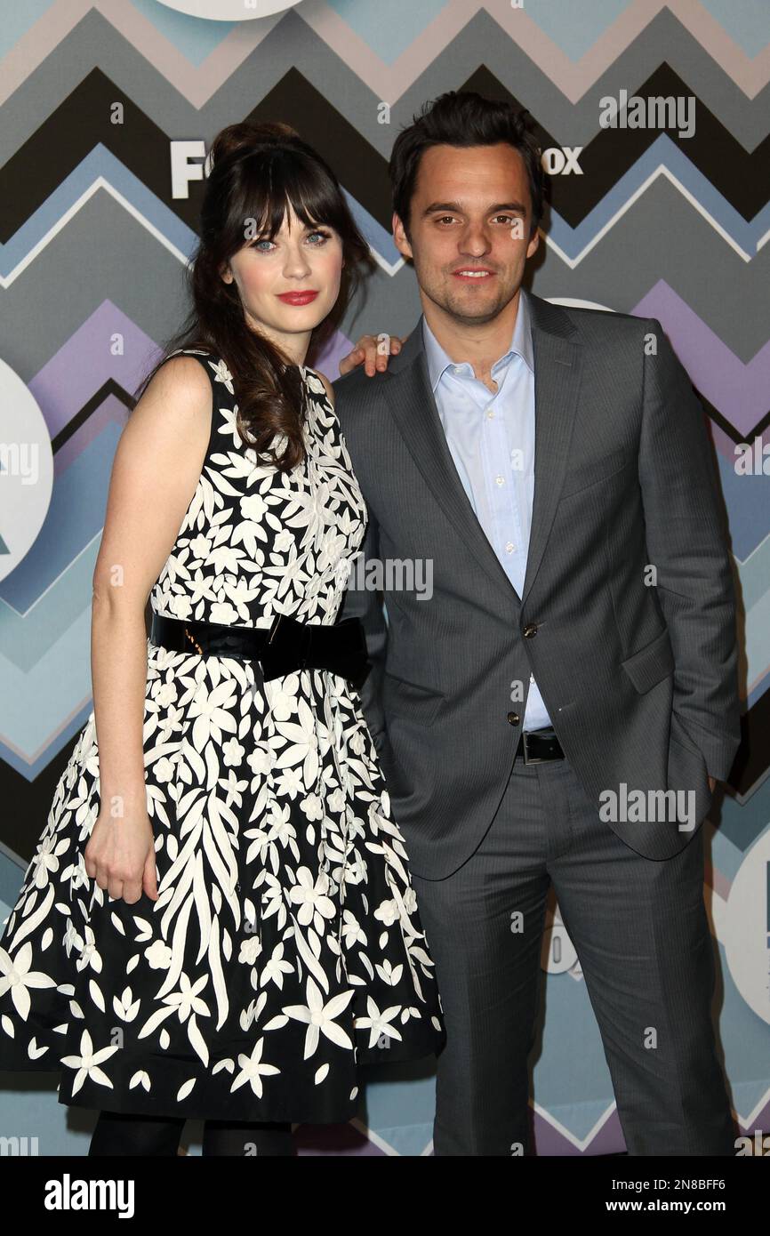 Zooey Deschanel, left, and Jake Johnson arrive at the Winter TCA Fox ...