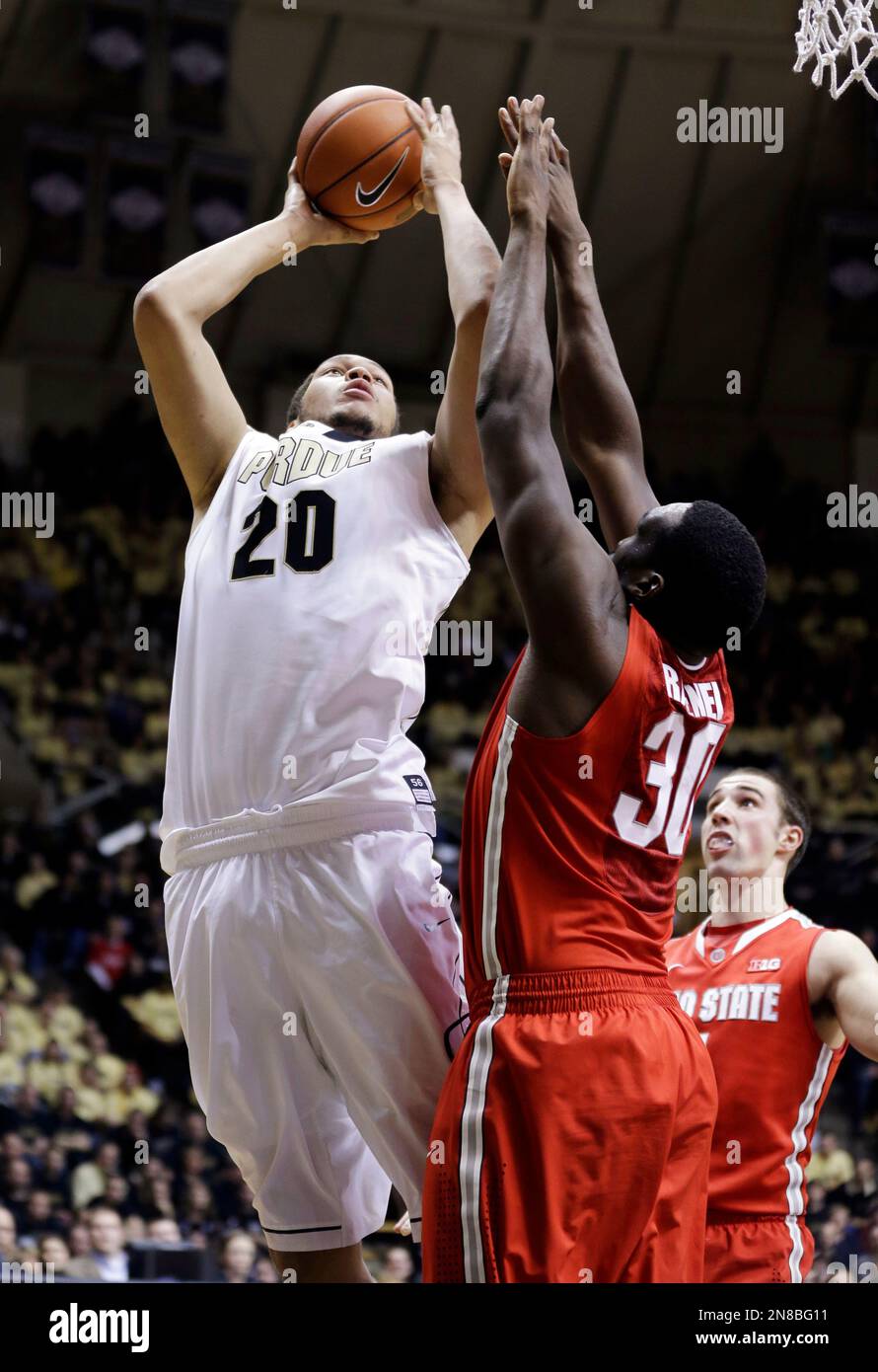 Purdue center A.J. Hammons (20) shoots over Ohio State forward Evan ...