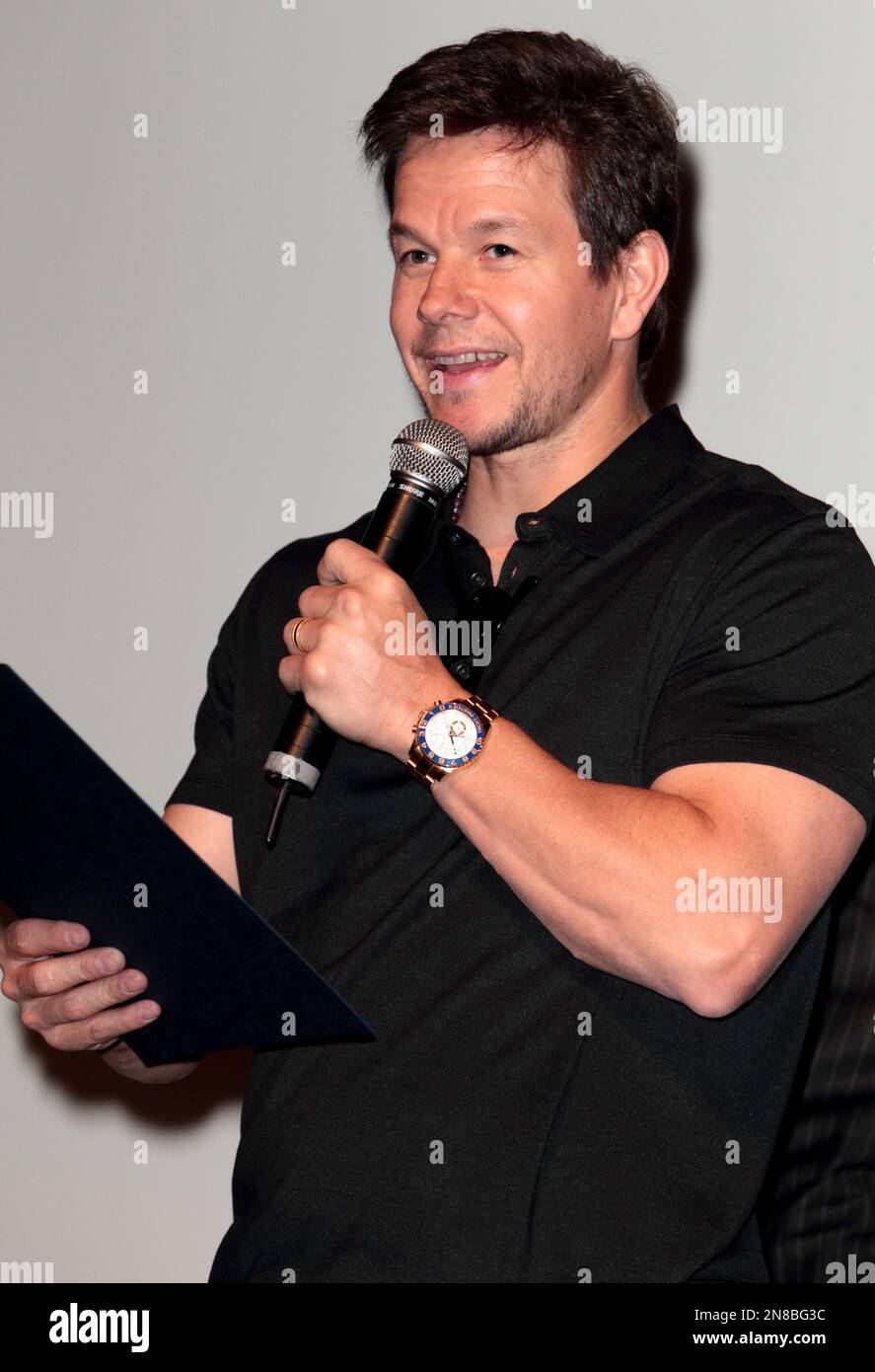 Actor Mark Wahlberg arrives for a screening of his new film Broken City ...