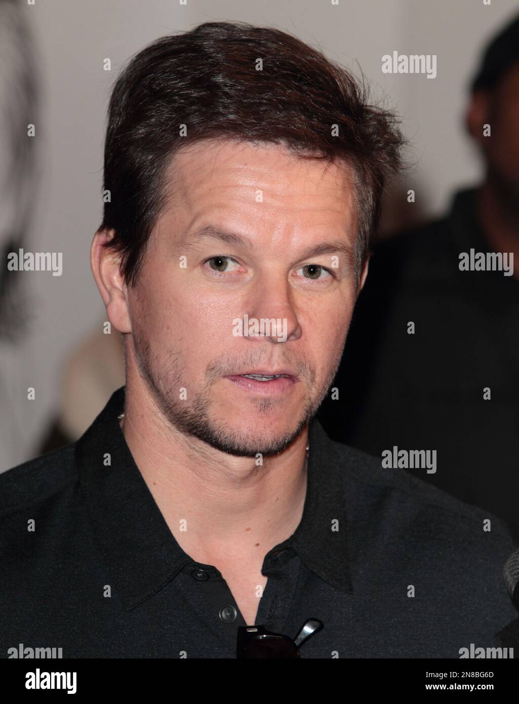 Actor Mark Wahlberg arrives for a screening of his new film Broken City ...