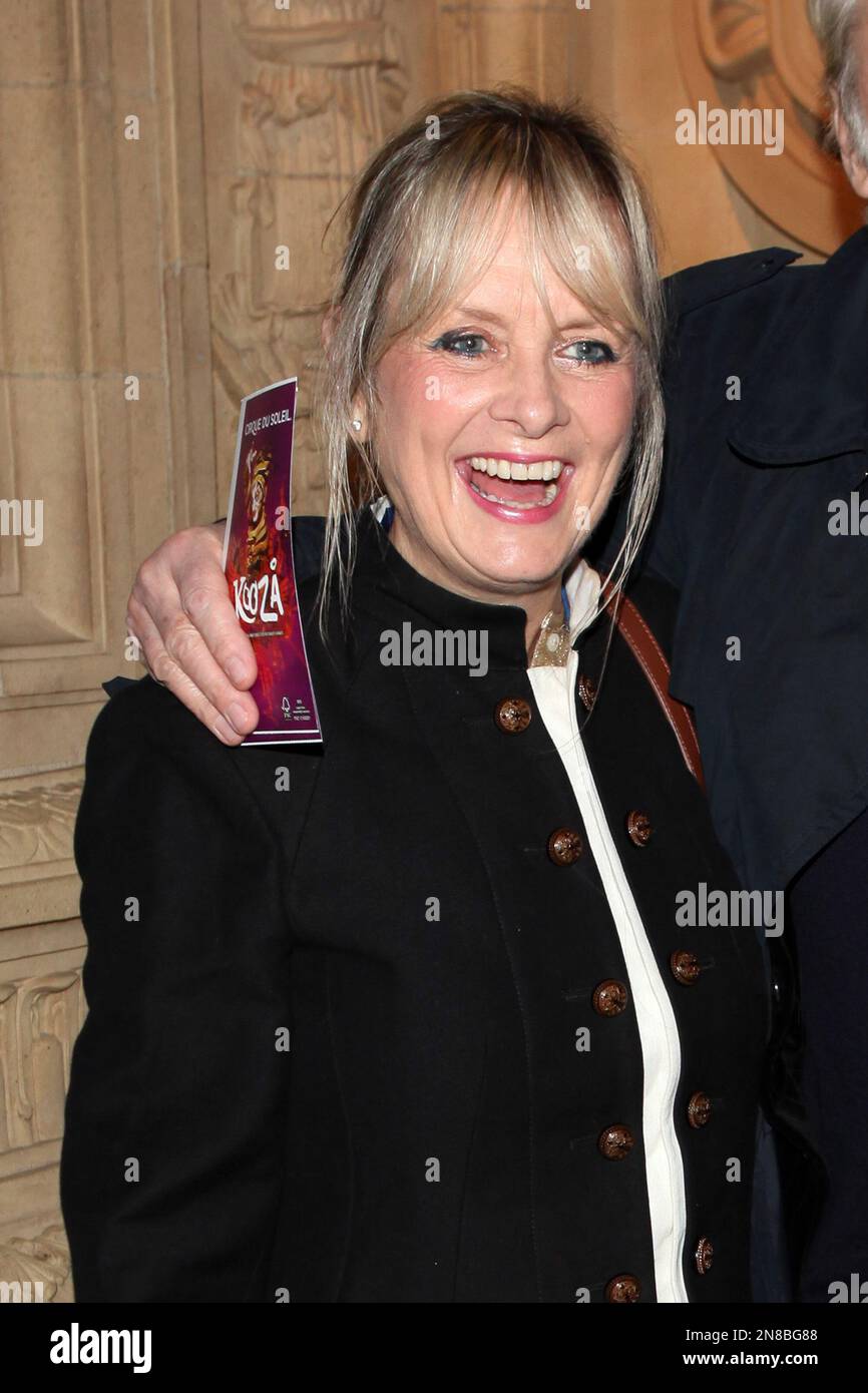 Twiggy poses for photographers as she arrives for the European premiere ...