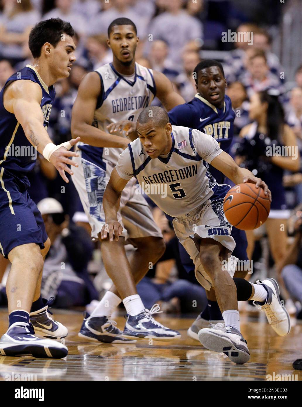 Georgetown guard Markel Starks (5) drives against Pittsburgh center ...
