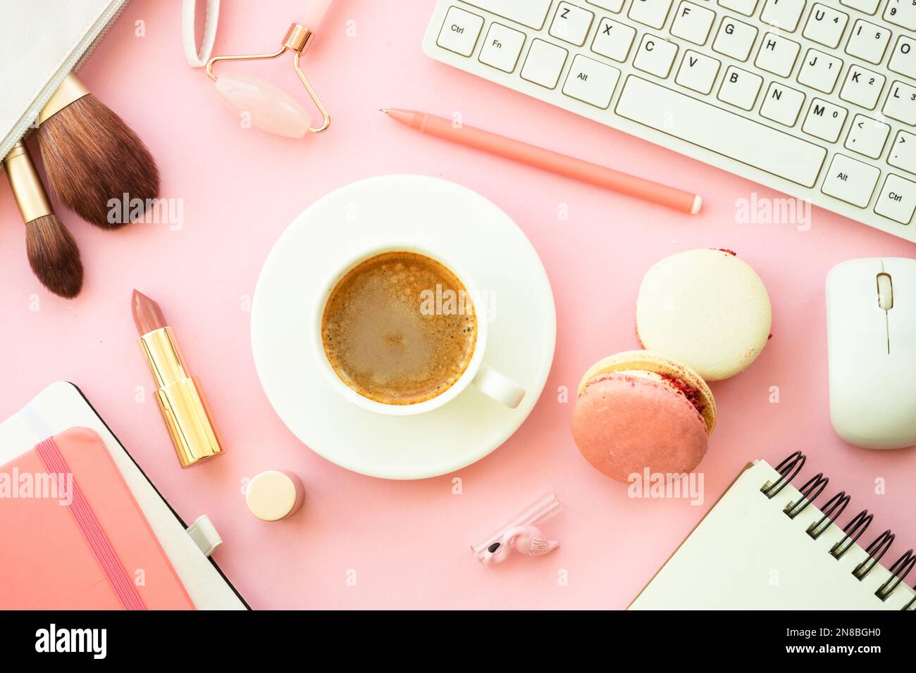 Creative Pink flat lay background with keyboard, notebook, coffee cup ...