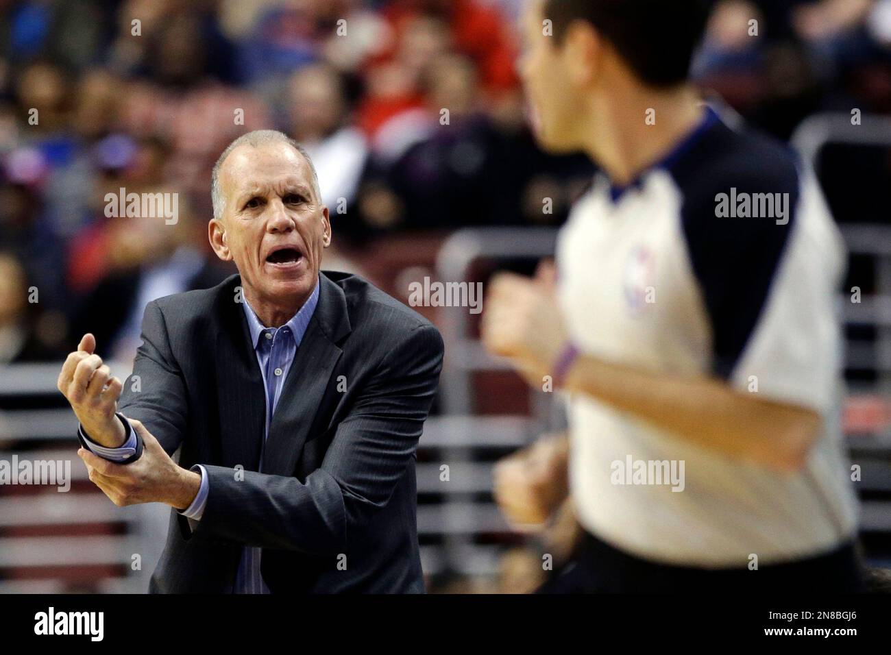 Philadelphia 76ers head coach Doug Collins, left, argues a call to ...