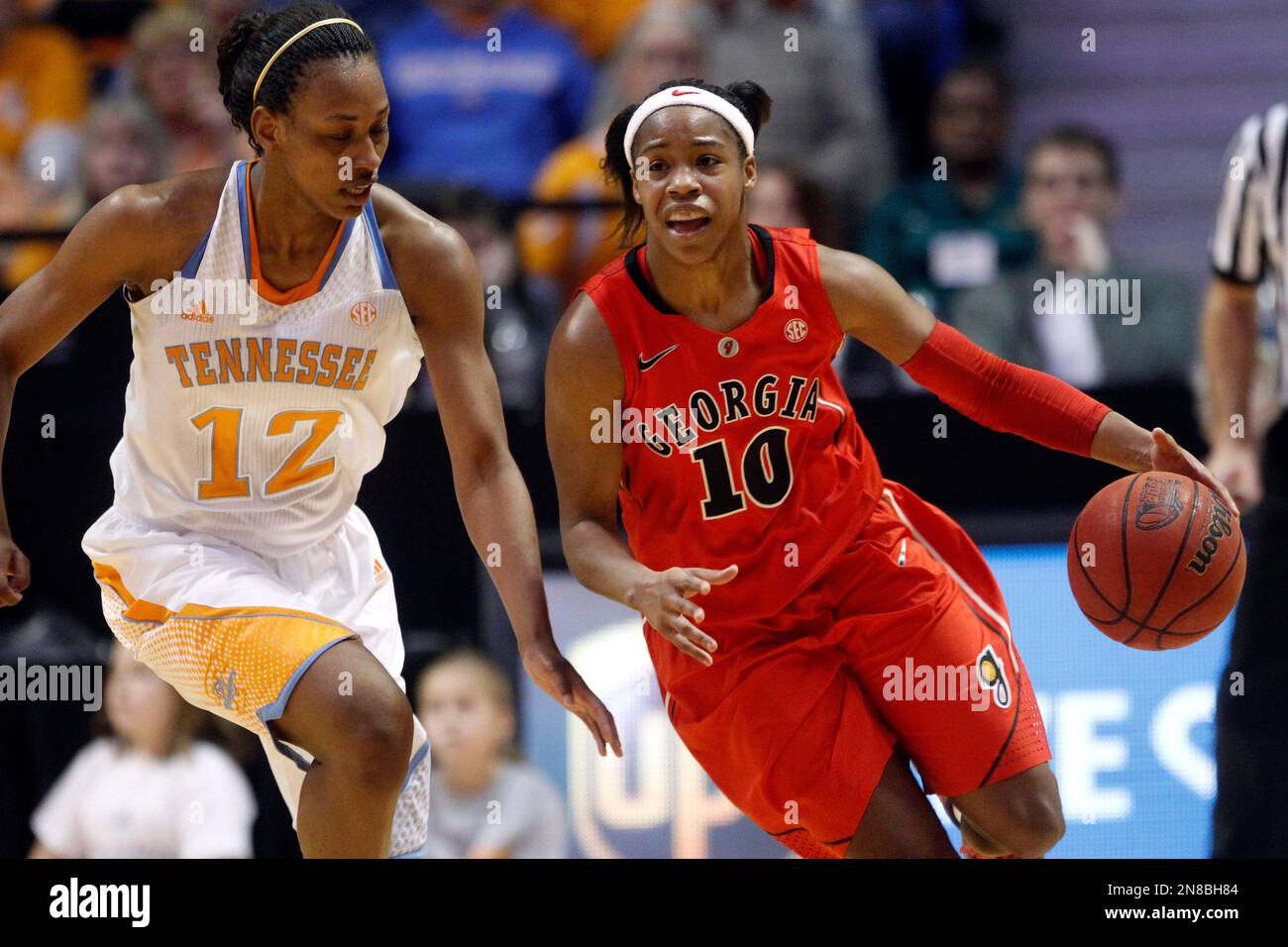 Georgia guard Jasmine James (10) drives past Tennessee forward Bashaara ...