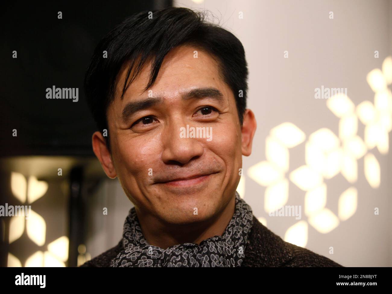 Hong Kong actor Tony Leung poses for the photographers during the ...