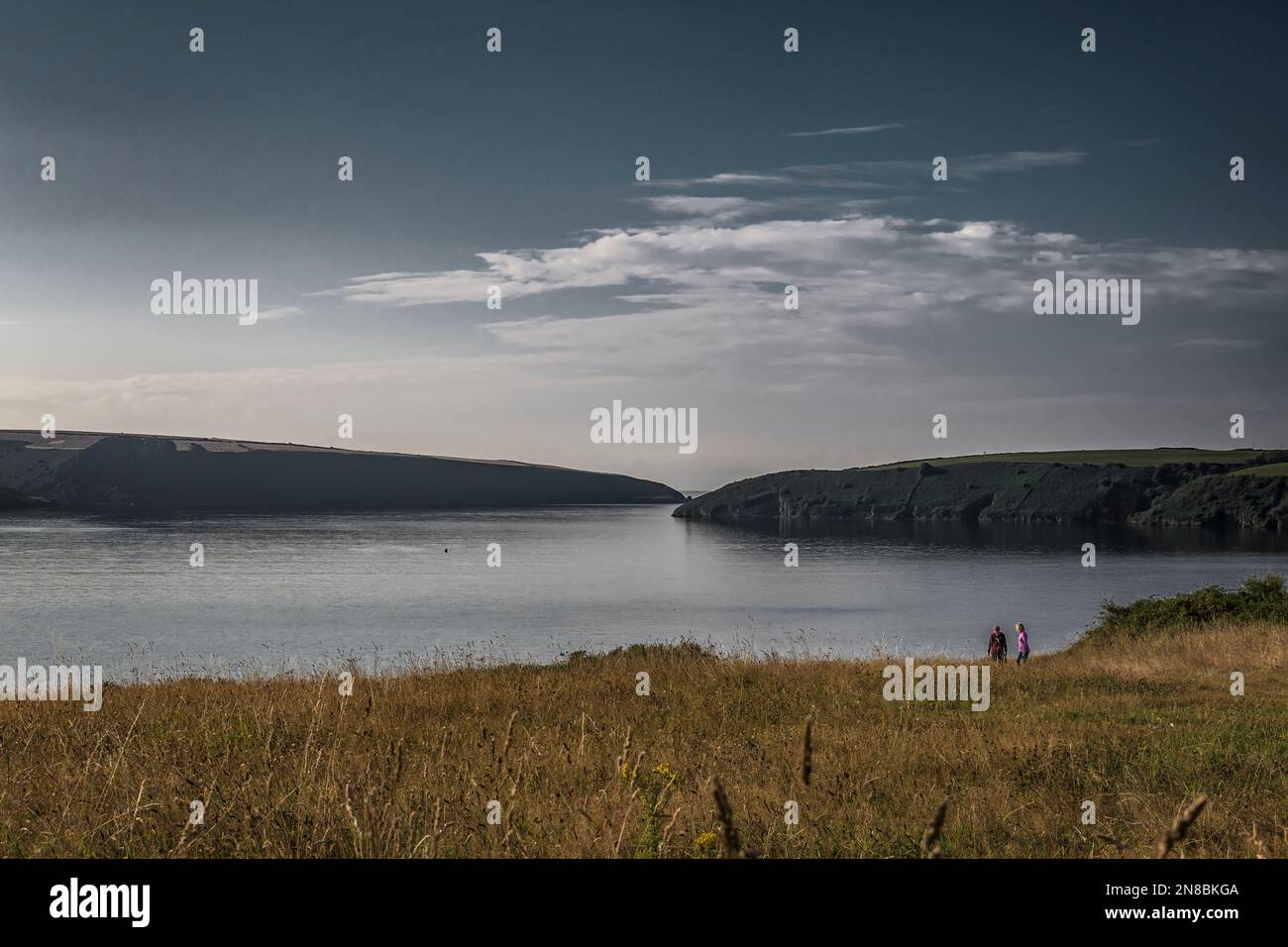 Women enjoying the summer weather at top of the hill at the ...