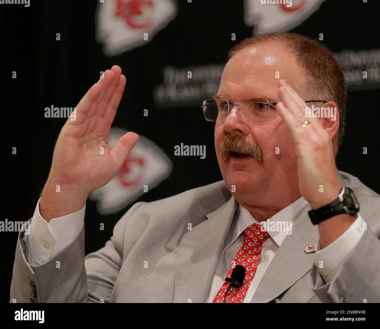 New Kansas City Chiefs NFL team head football coach Andy Reid talks to ...