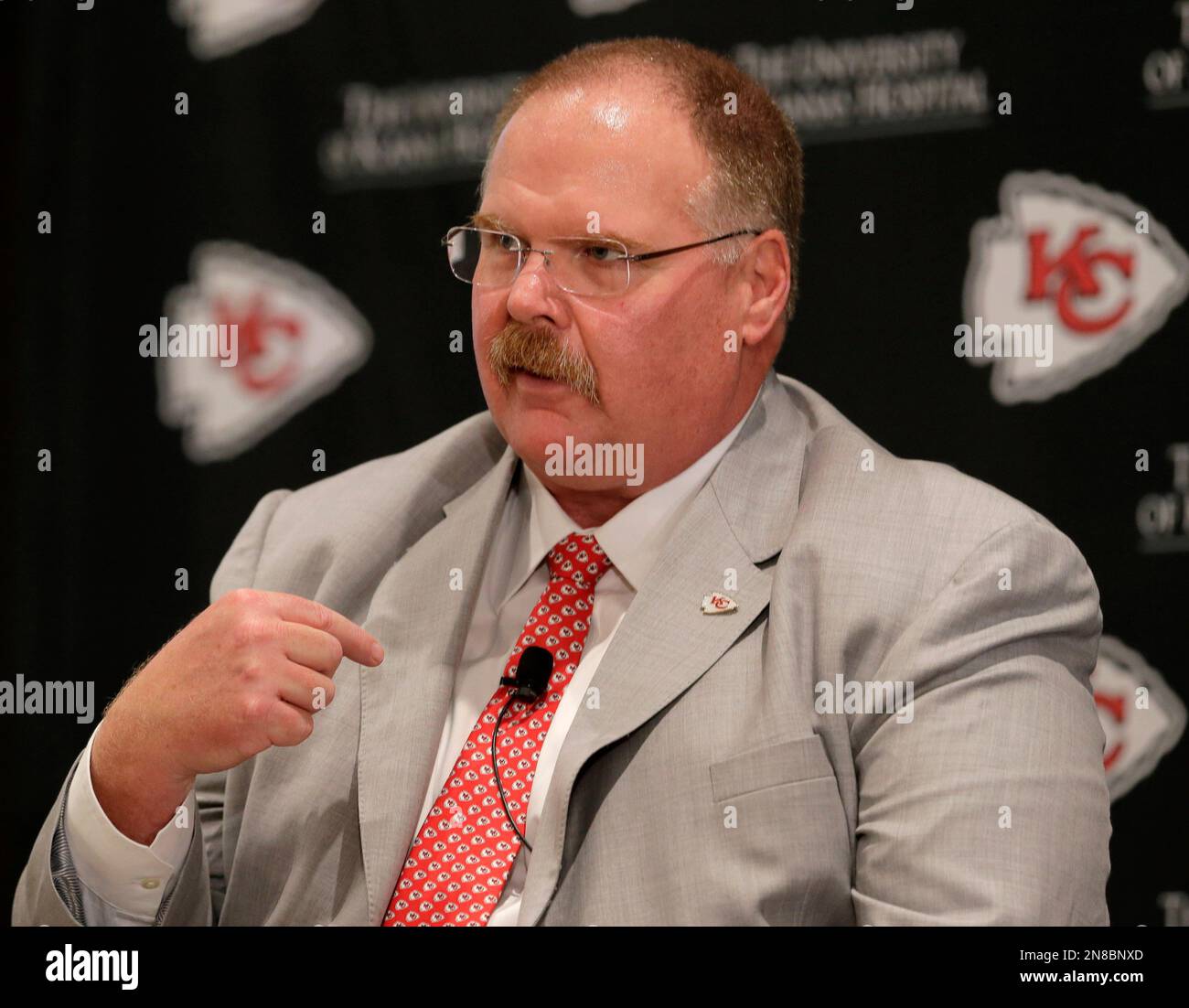 New Kansas City Chiefs NFL team head football coach Andy Reid talks to ...