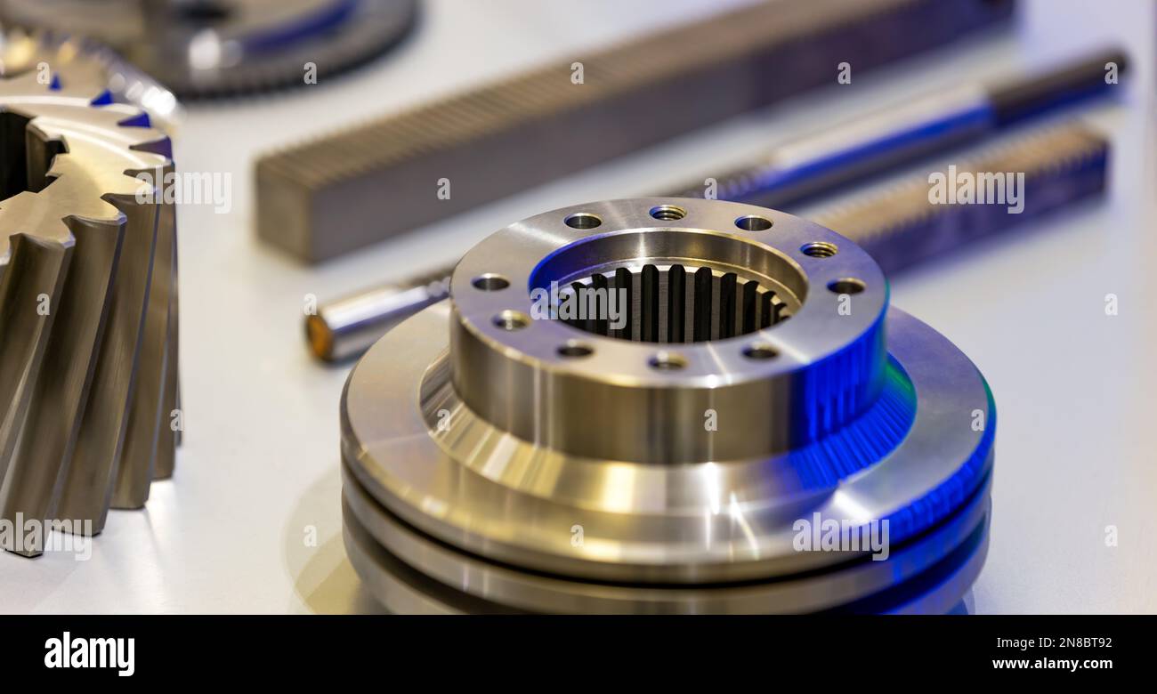 banner or close up of metal mechanical gears with light background ...