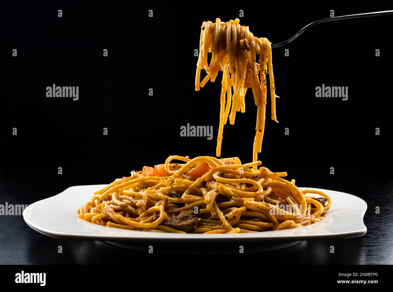 Spaghetti noodles wrapped on a fork hi-res stock photography and images ...