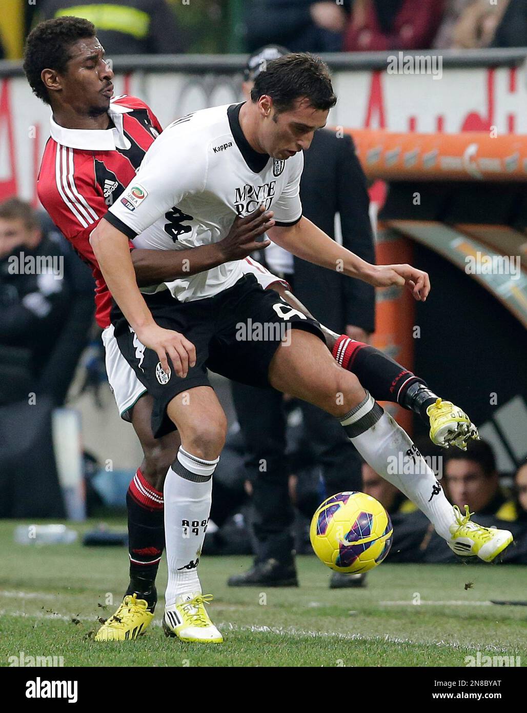 AC Milan midfielder Kevin Constant, left, of Guinea, challenges for the ...