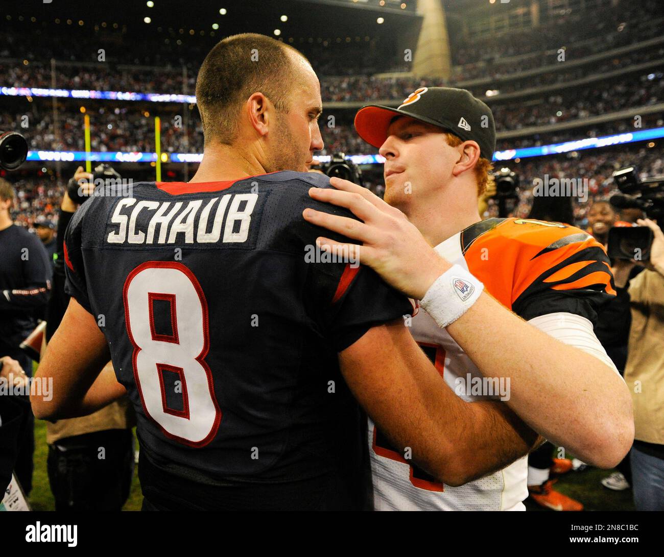 Houston Texans' Matt Schaub (8) talks with Cincinnati Bengals' Andy ...