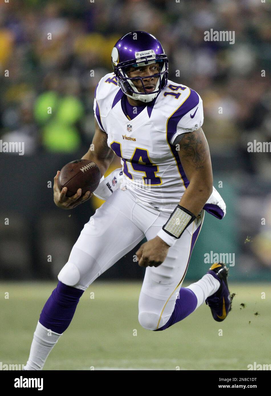 Minnesota Vikings quarterback Joe Webb (14) runs during the first half ...