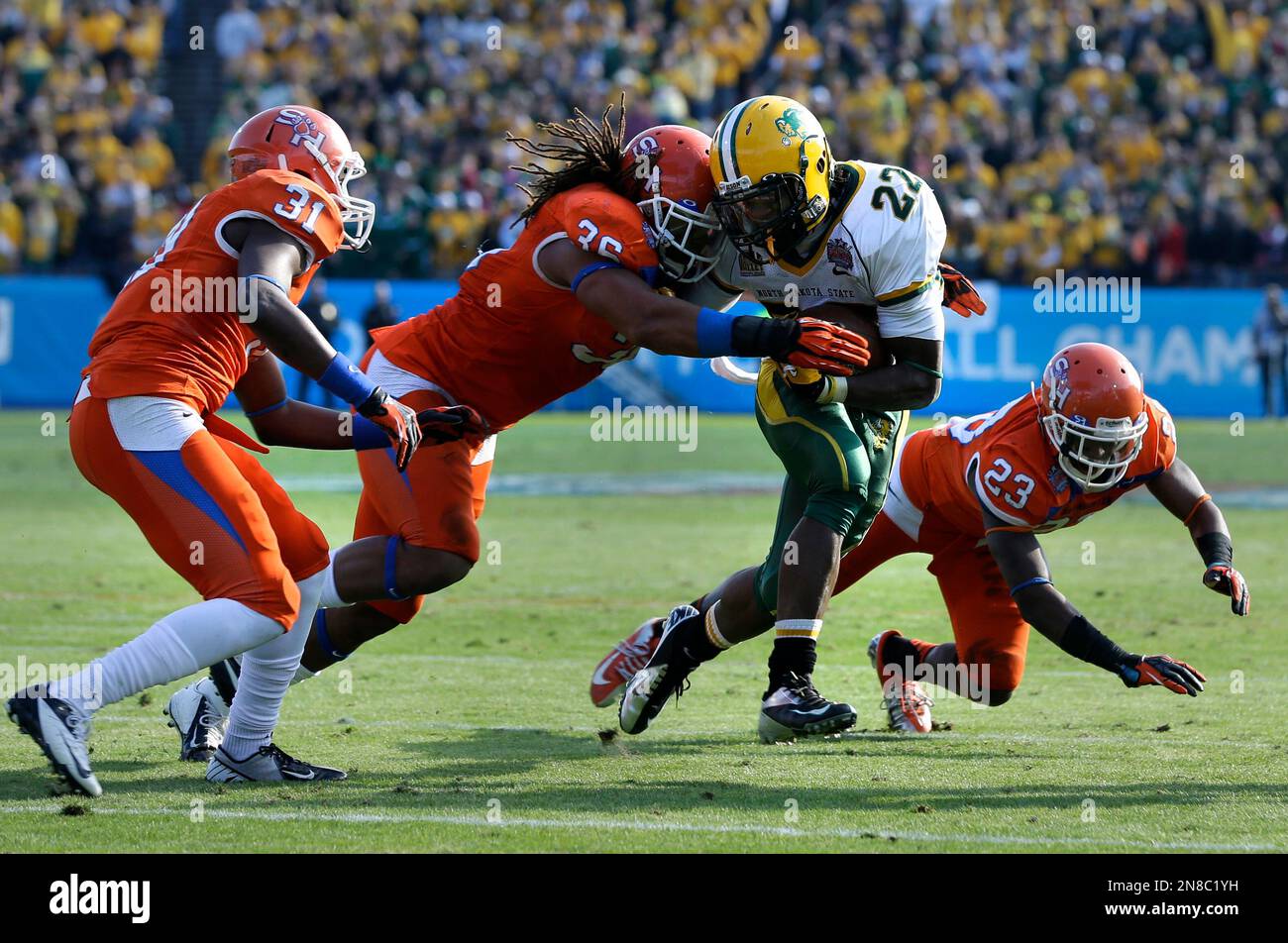 Sam Houston State's Michael Wade (31) Darius Taylor (36) and Robert ...