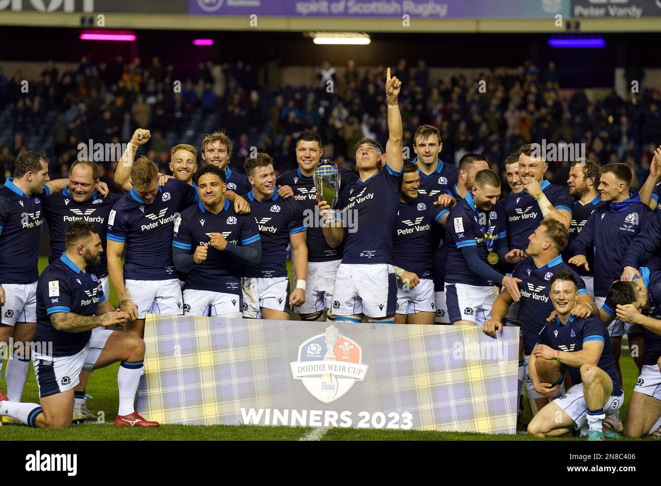 Scotland captain Jamie Ritchie lifts the Doddie Weir Cup after the ...