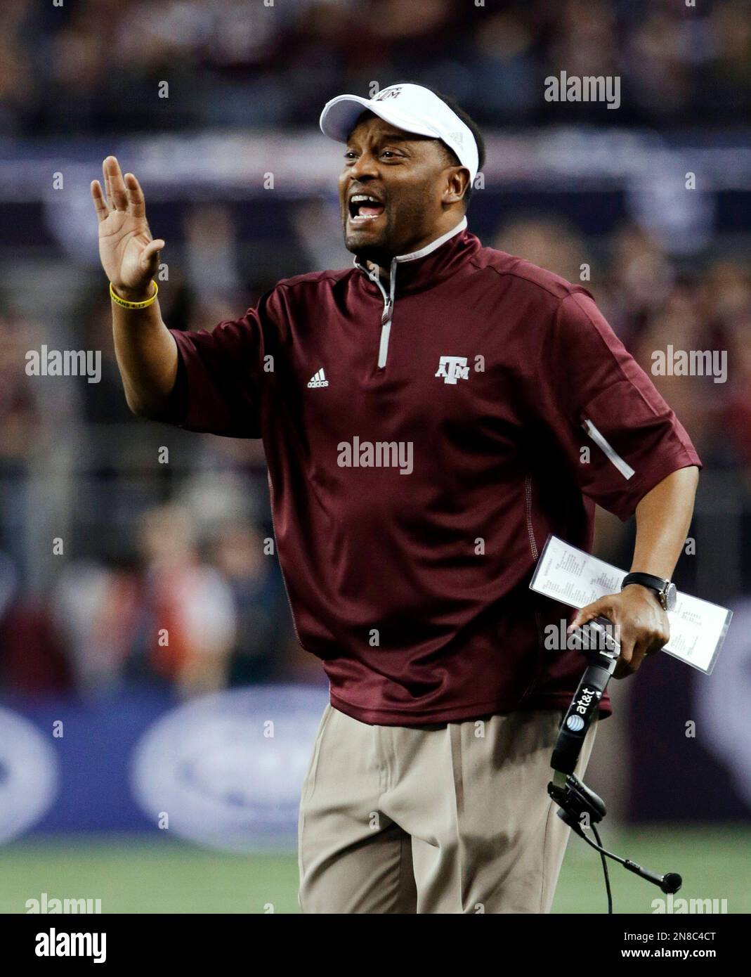 Texas A&M coach Kevin Sumlin calls out to his defense during the first ...