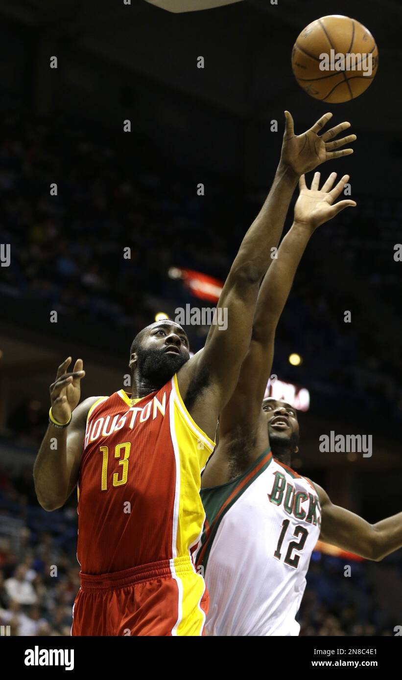 Houston Rockets' James Harden (13) shoots against Milwaukee Bucks' Luc ...