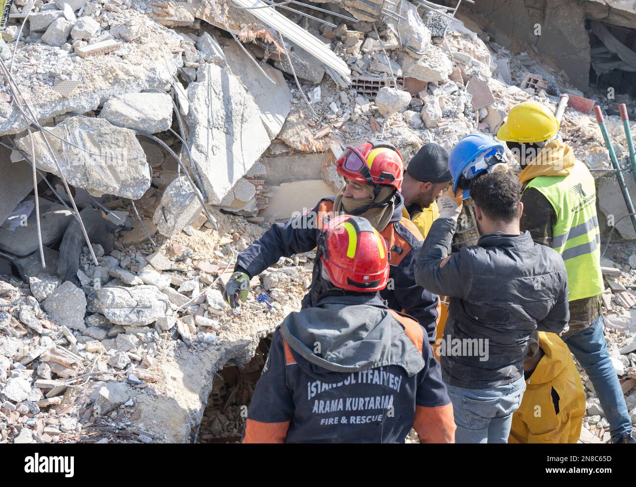 Antakya, Turkey. 11th Feb, 2023. Helpers have dug a tunnel to a buried ...