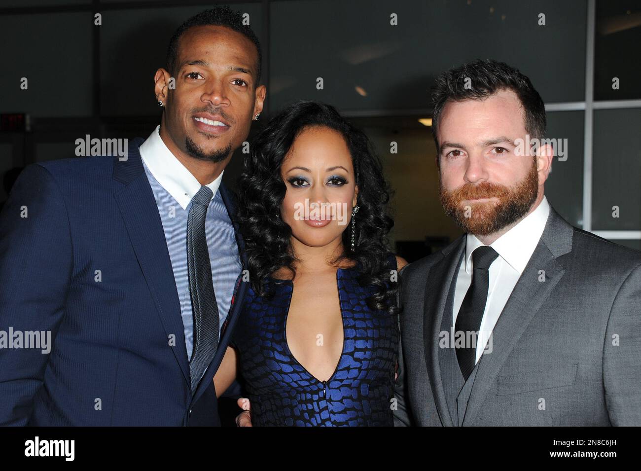 Marlon Wayans, left, Essence Atkins and Micheal Tiddes attend the world ...