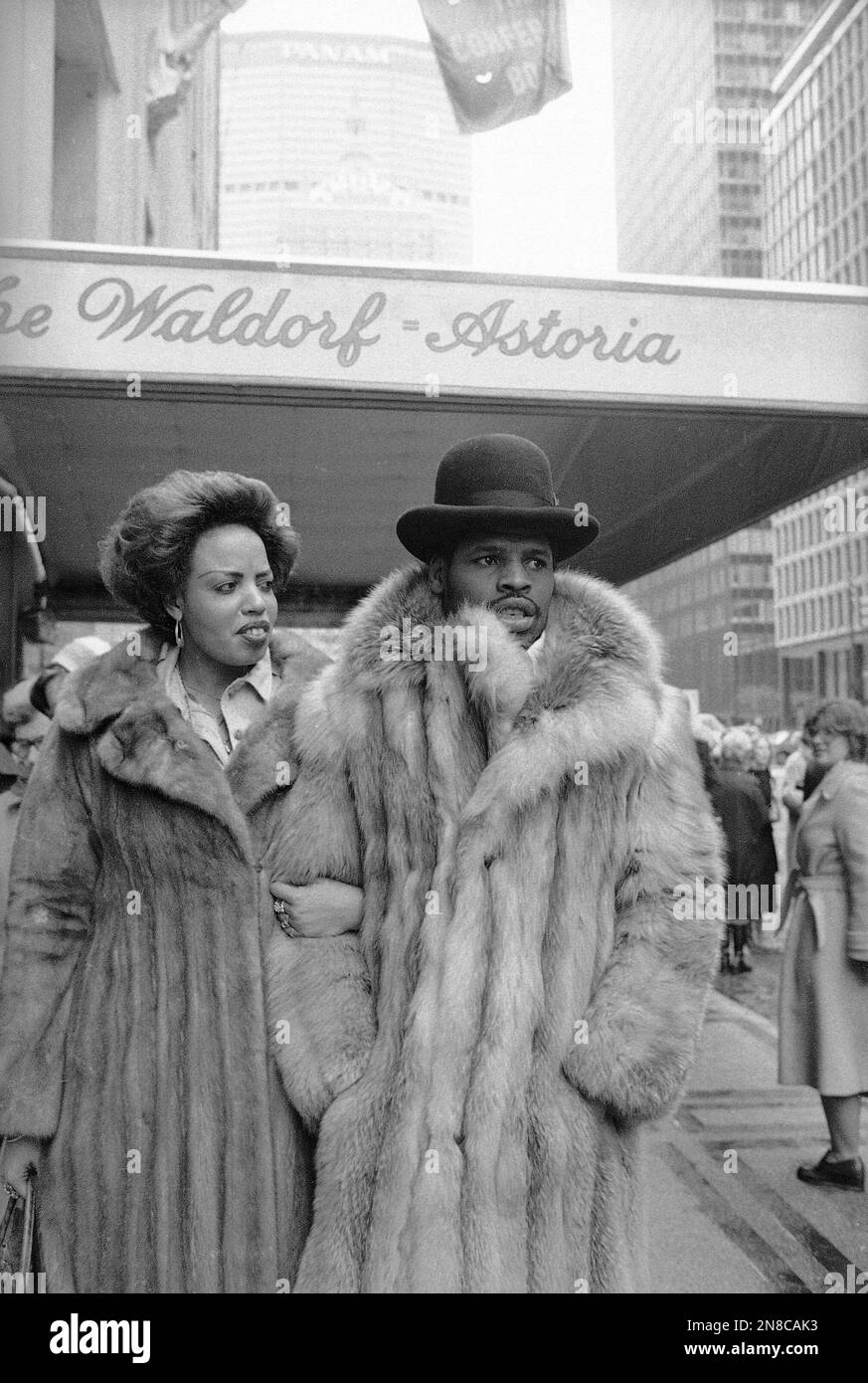 Leon Spinks with his wife Nova on Park Avenue in New York City, Feb. 13 ...