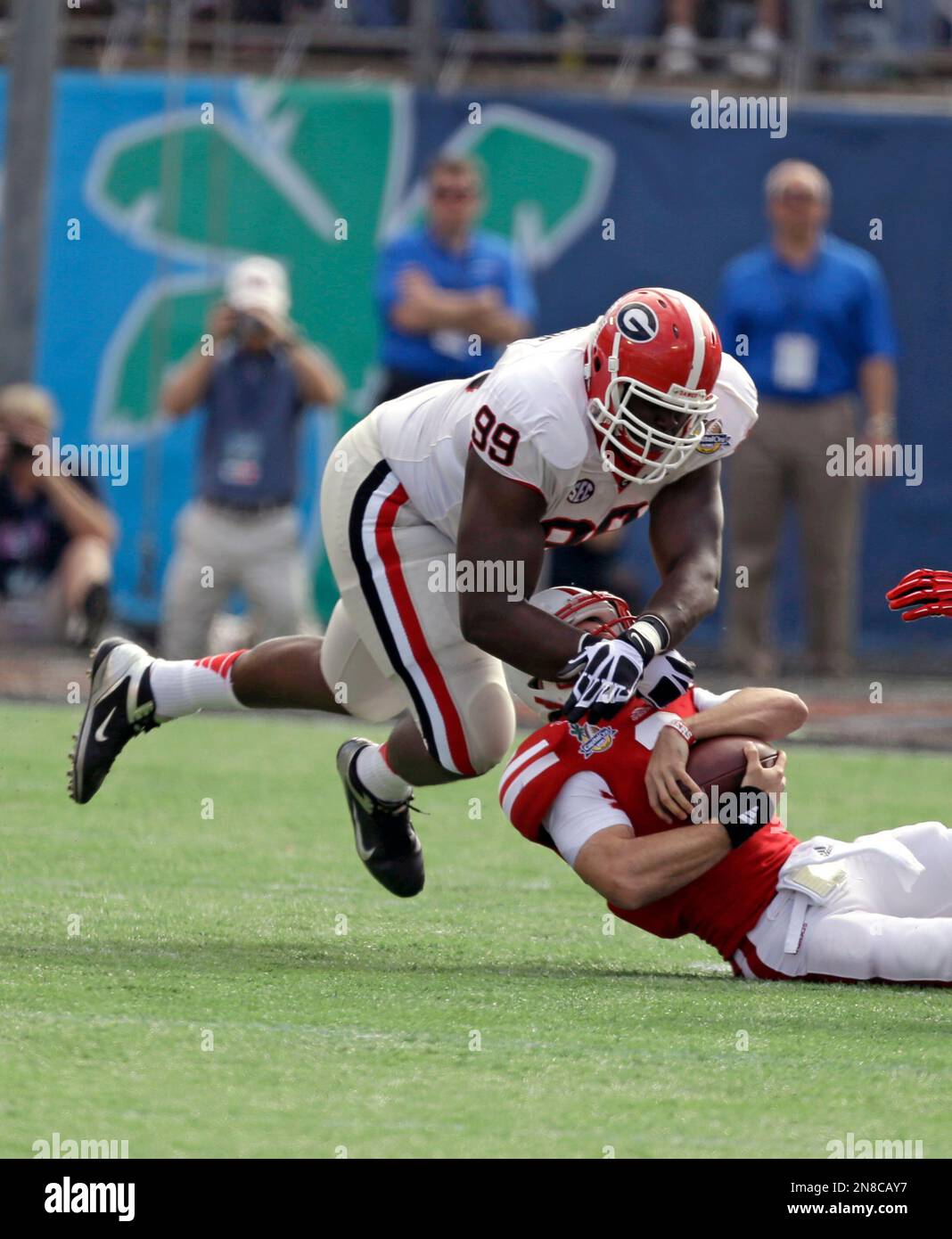 Georgia defensive lineman Kwame Geathers (99) stops Nebraska ...