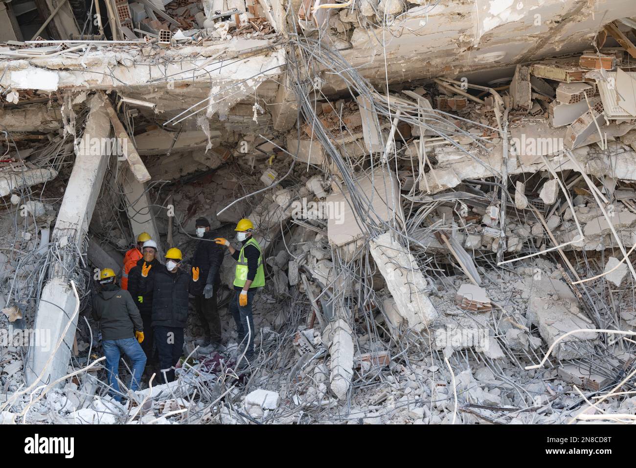 Antakya, Turkey. 11th Feb, 2023. Helpers are searching for people ...