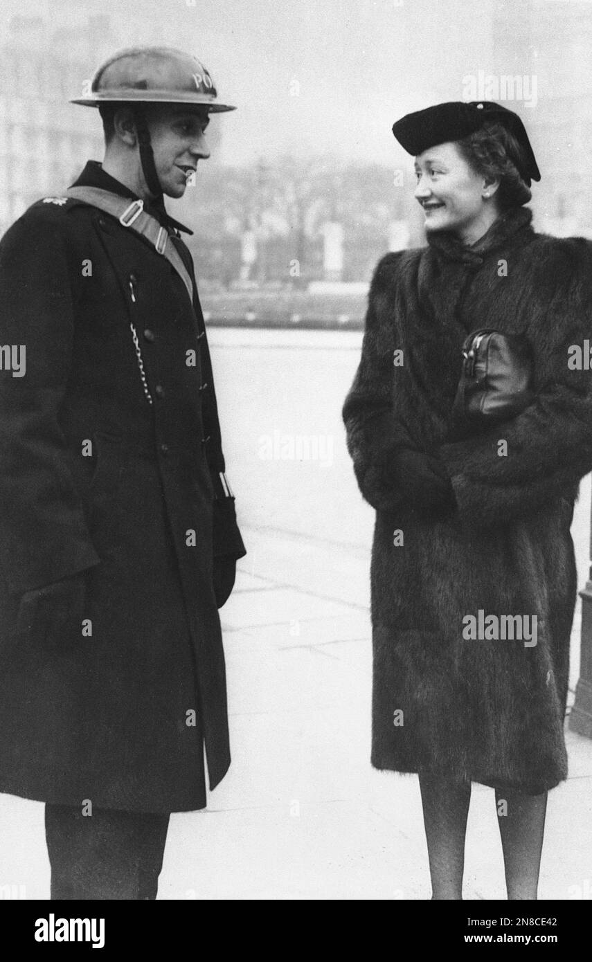 Beatrice Rathbone, American-born member of Parliament, stops to chat ...