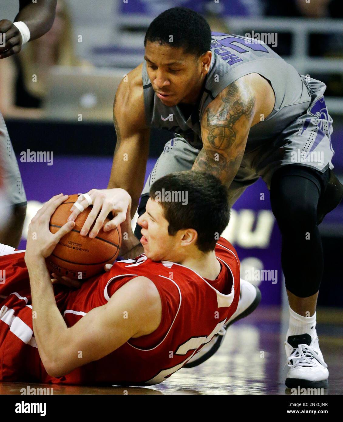 South Dakota forward Tyler Flack (23) and Kansas State guard Rodney ...