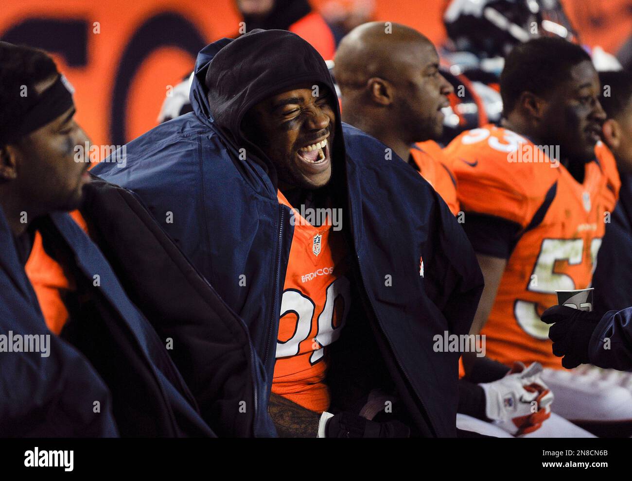 Denver Broncos defensive tackle Kevin Vickerson smiles on the bench in ...