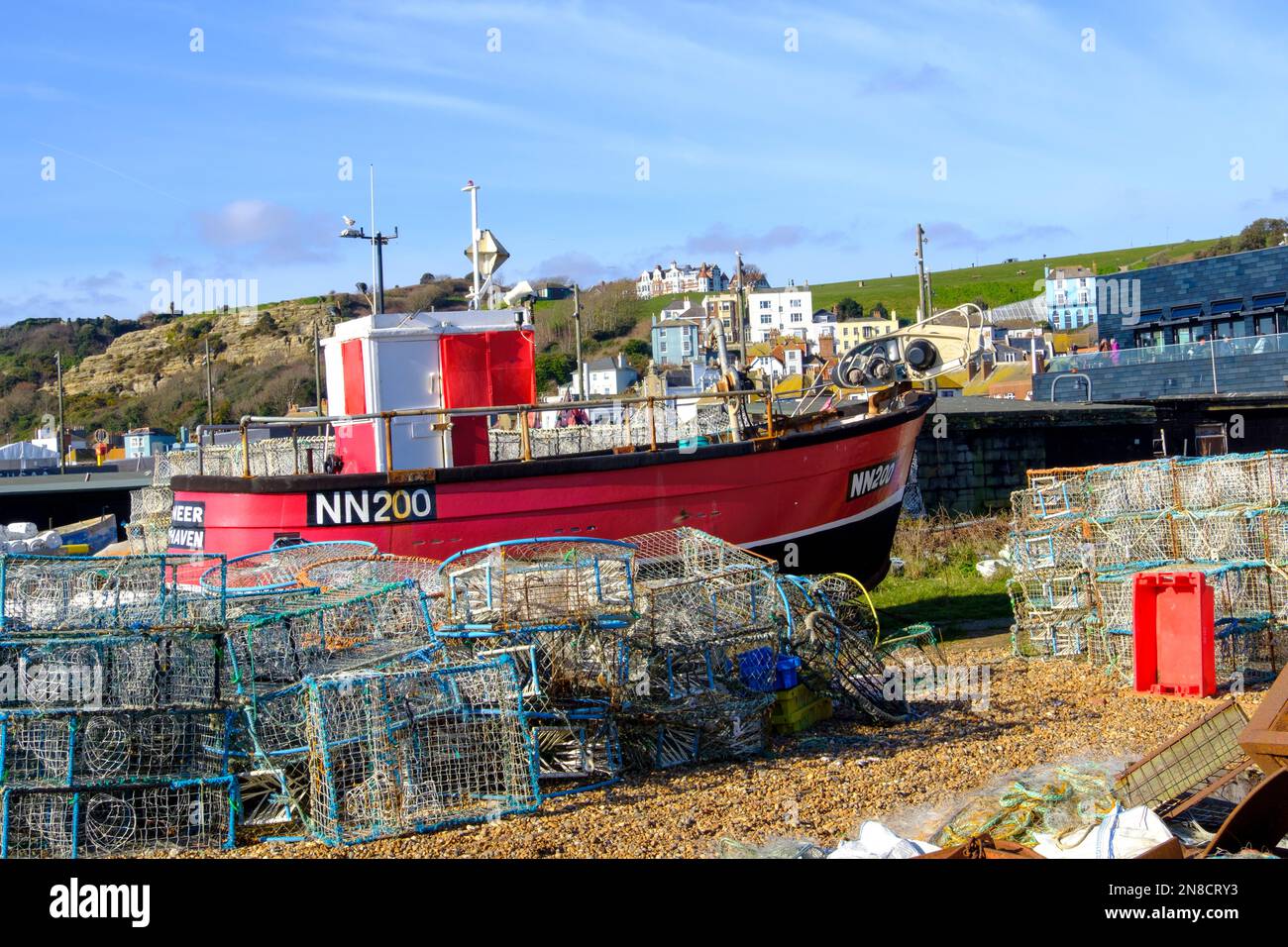 Hastings fishing boat and nets on the Stade Fishermen's Beach, East ...