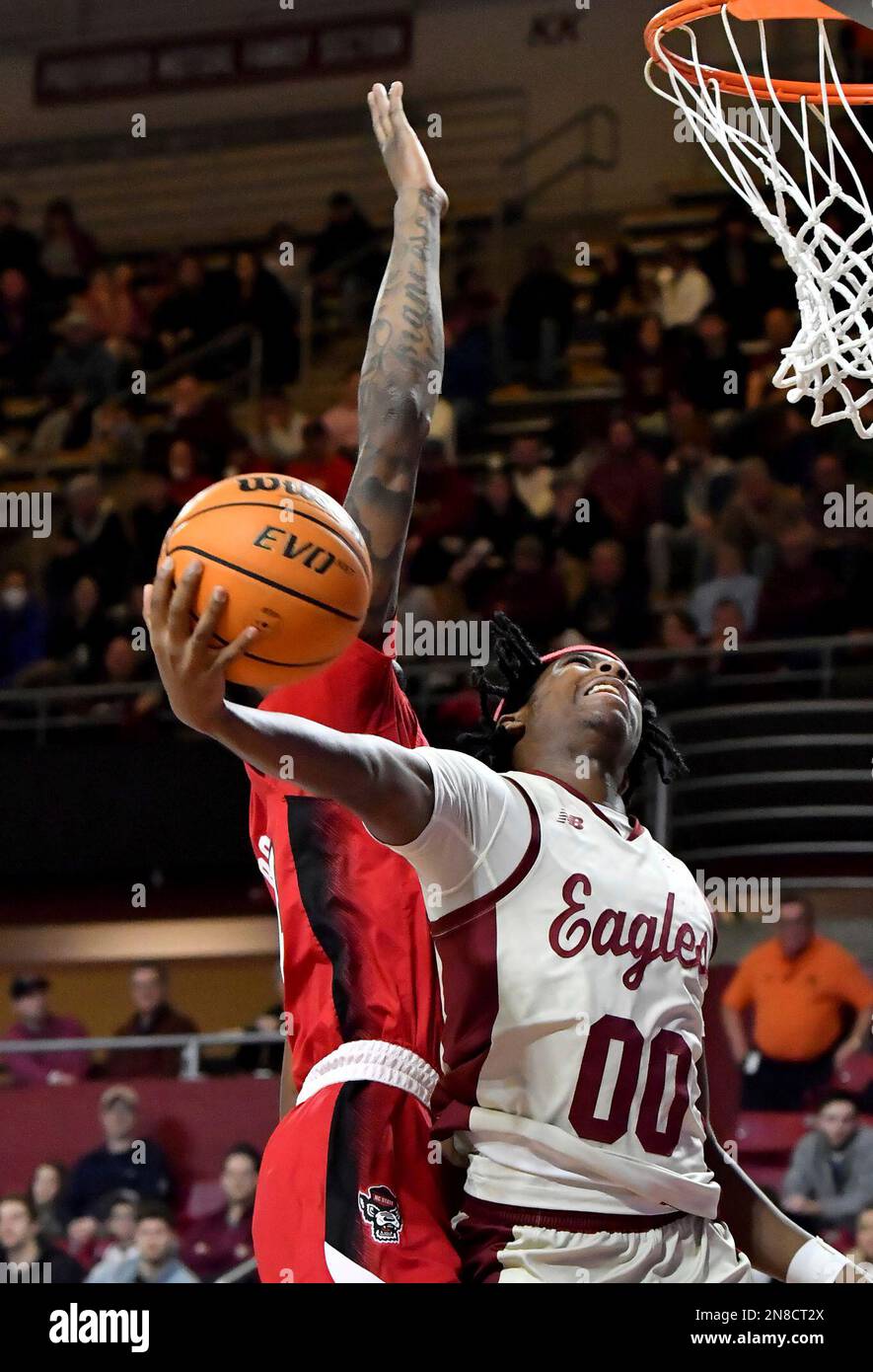 Boston College's Chas Kelley III (00) is fouled by North Carolina State ...