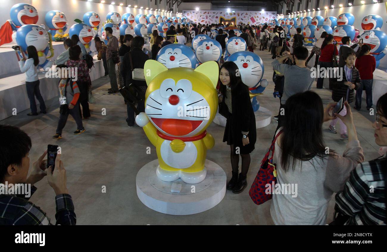 People take photos at the "100 Years Before the Birth of Doraemon ...