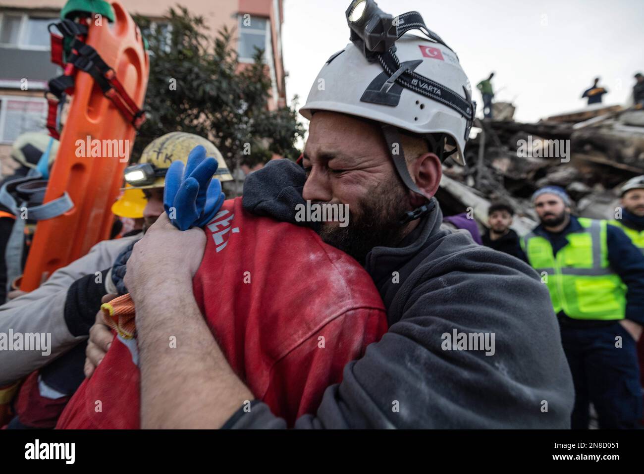 Adana, Turkey, Turkey. 11th Feb, 2023. A father rejoices after his ...