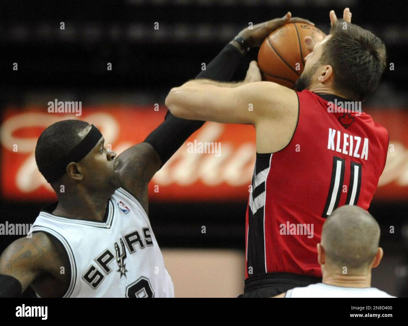 San Antonio Spurs forward Stephen Jackson, left, blocks a shot-attempt ...