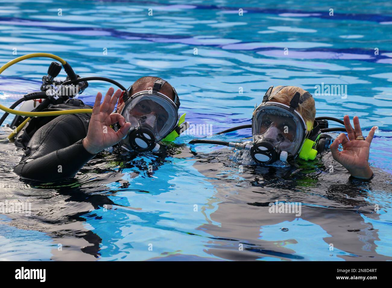 May 24, 2017 - Tuscany, Italy: A woman wear a full face diving mask ...