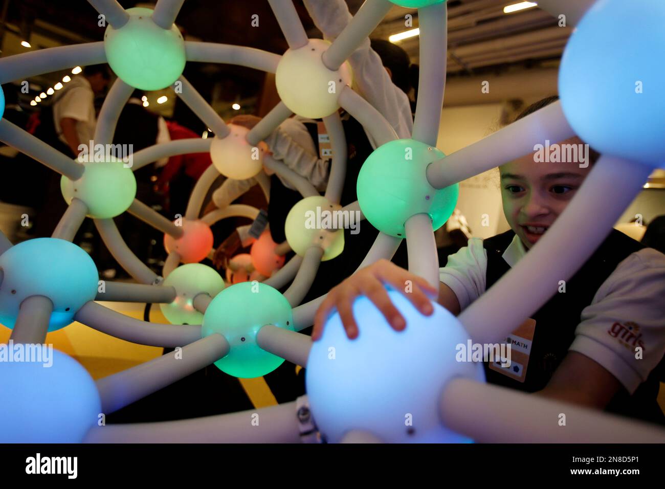 Girls Preparatory student Faith Guzman, 7, tries out an interactive ...