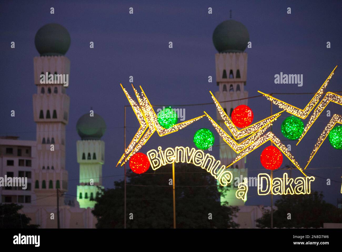 In this Wednesday, Dec. 12, 2012 photo, Christmas lights reading ...