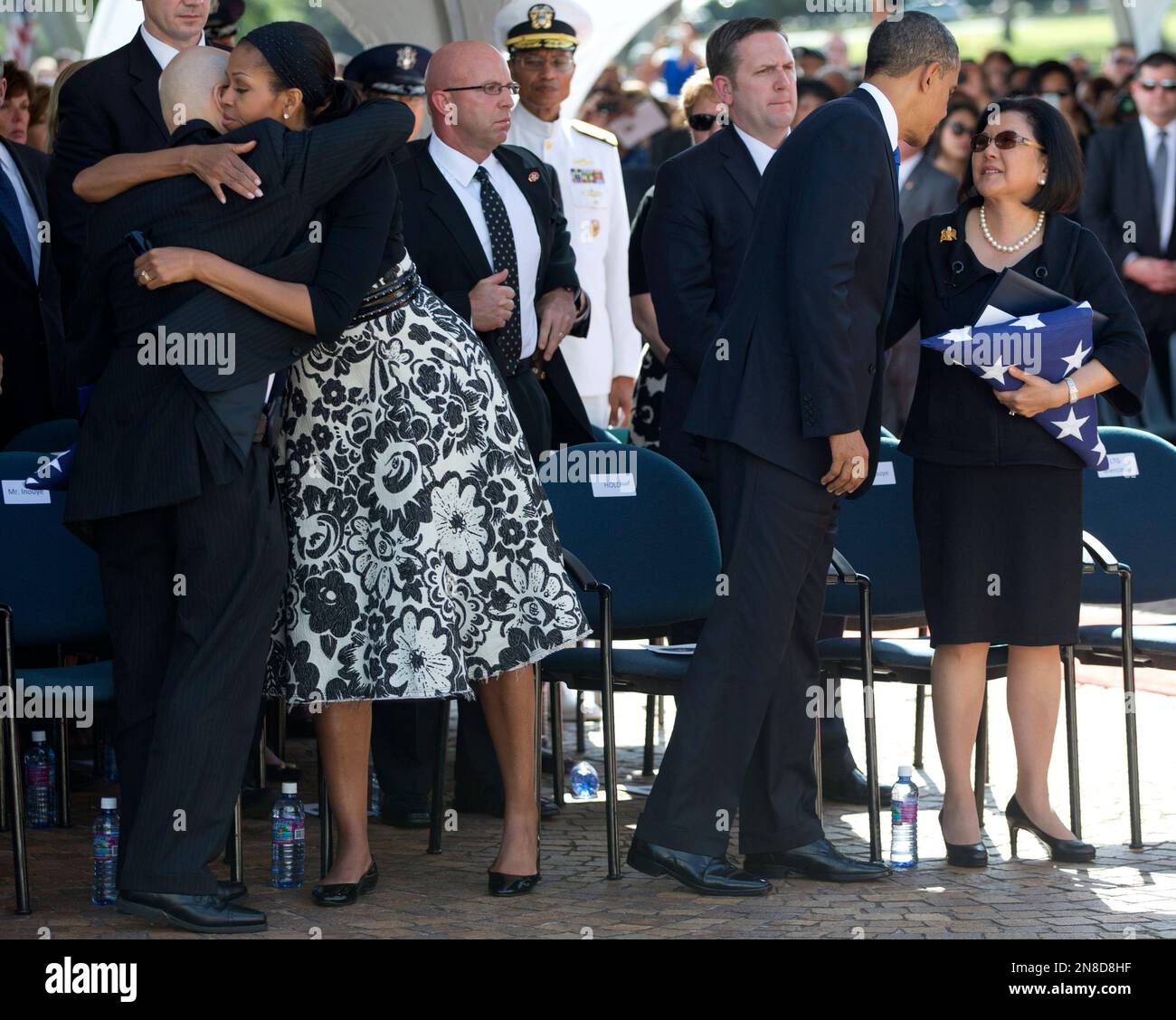 President Barack Obama, center right, comforts Irene Hirano Inouye ...