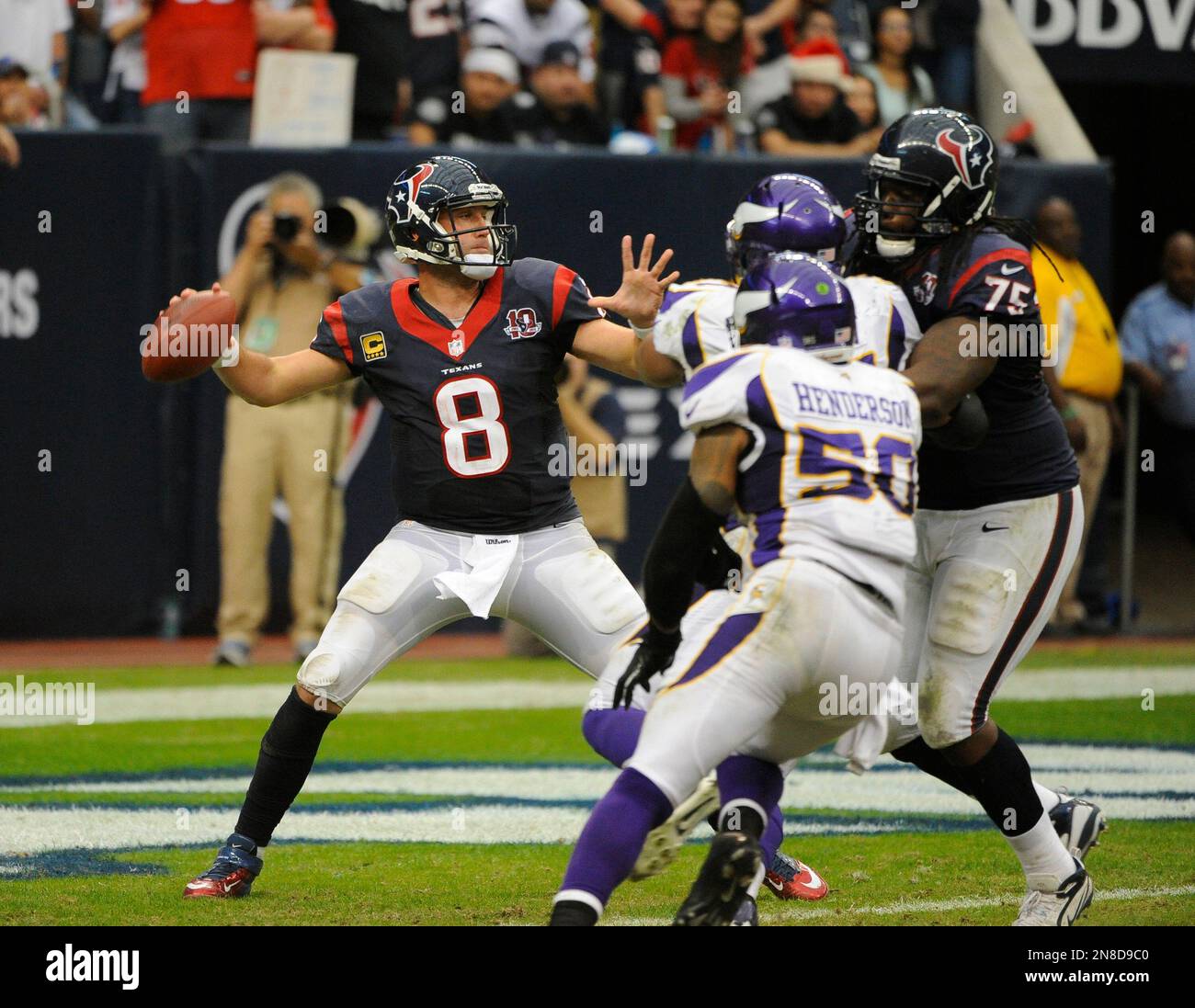 Houston Texans' Matt Schaub (8) passes out of the end zone during the ...