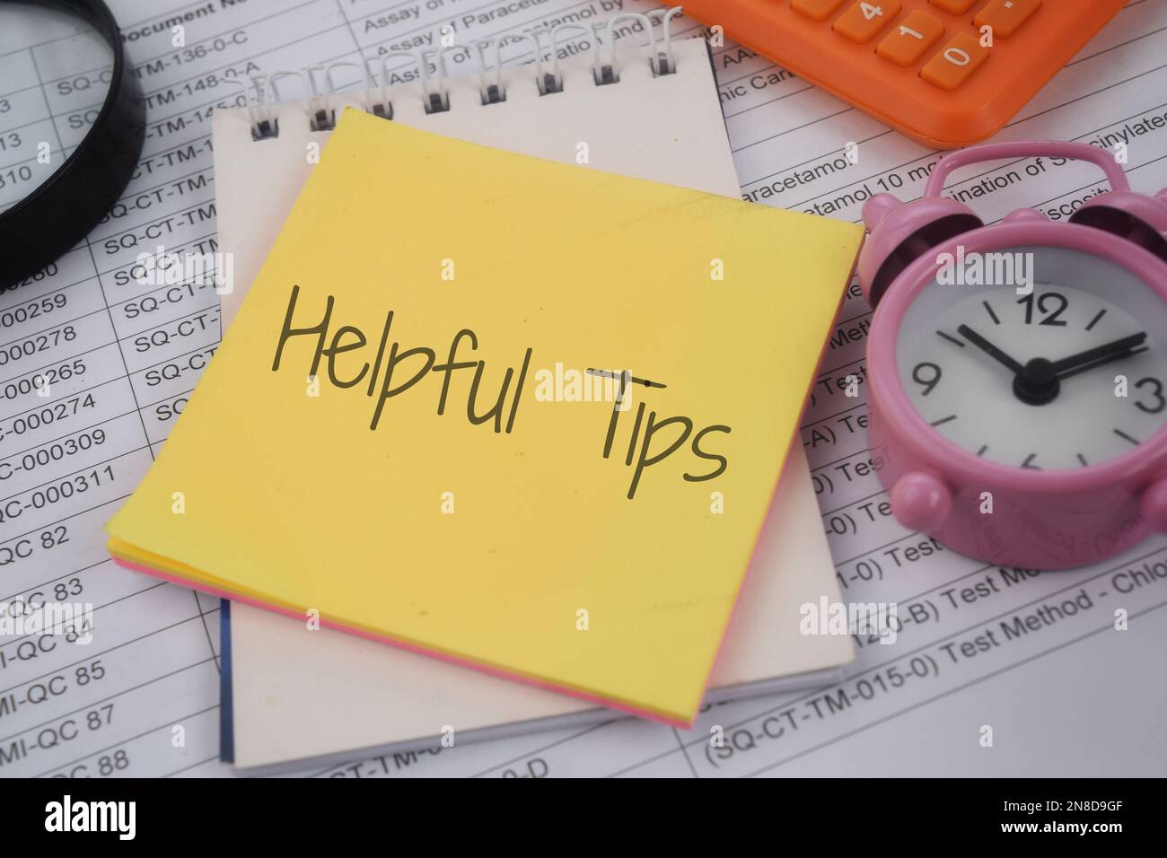 The Helpful Tips text on a paper Stock Photo - Alamy