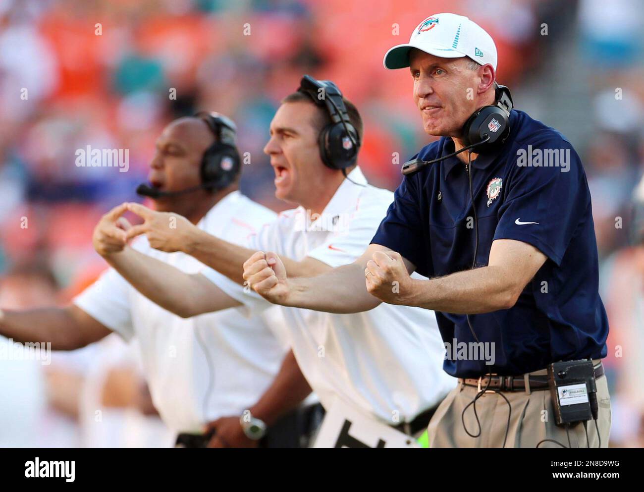 Miami Dolphins head coach Joe Philbin, right, gestures during the ...