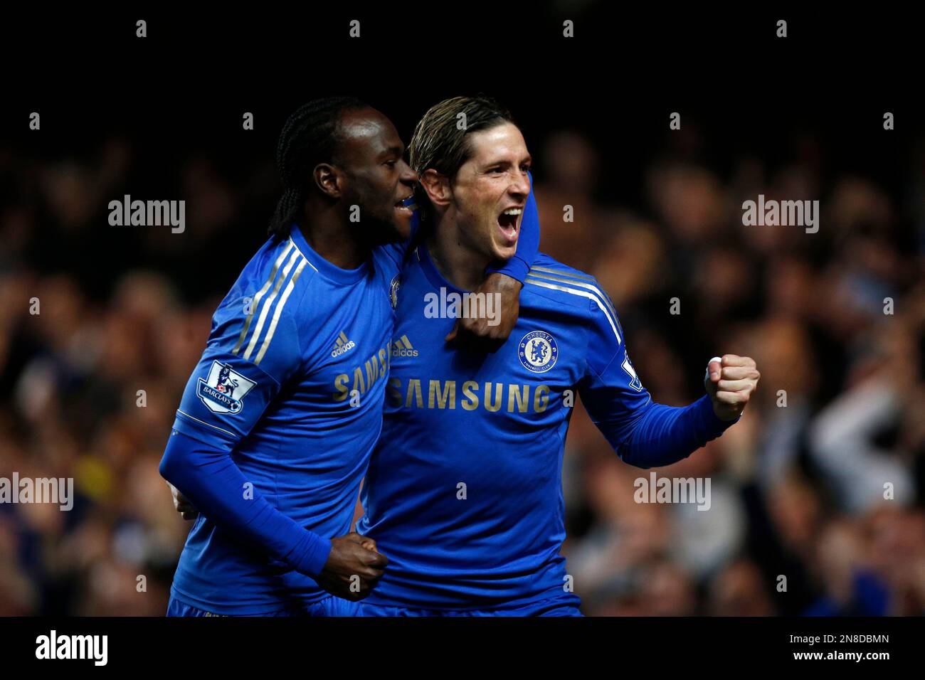Chelsea's Fernando Torres, right, celebrates his goal with Victor Moses ...