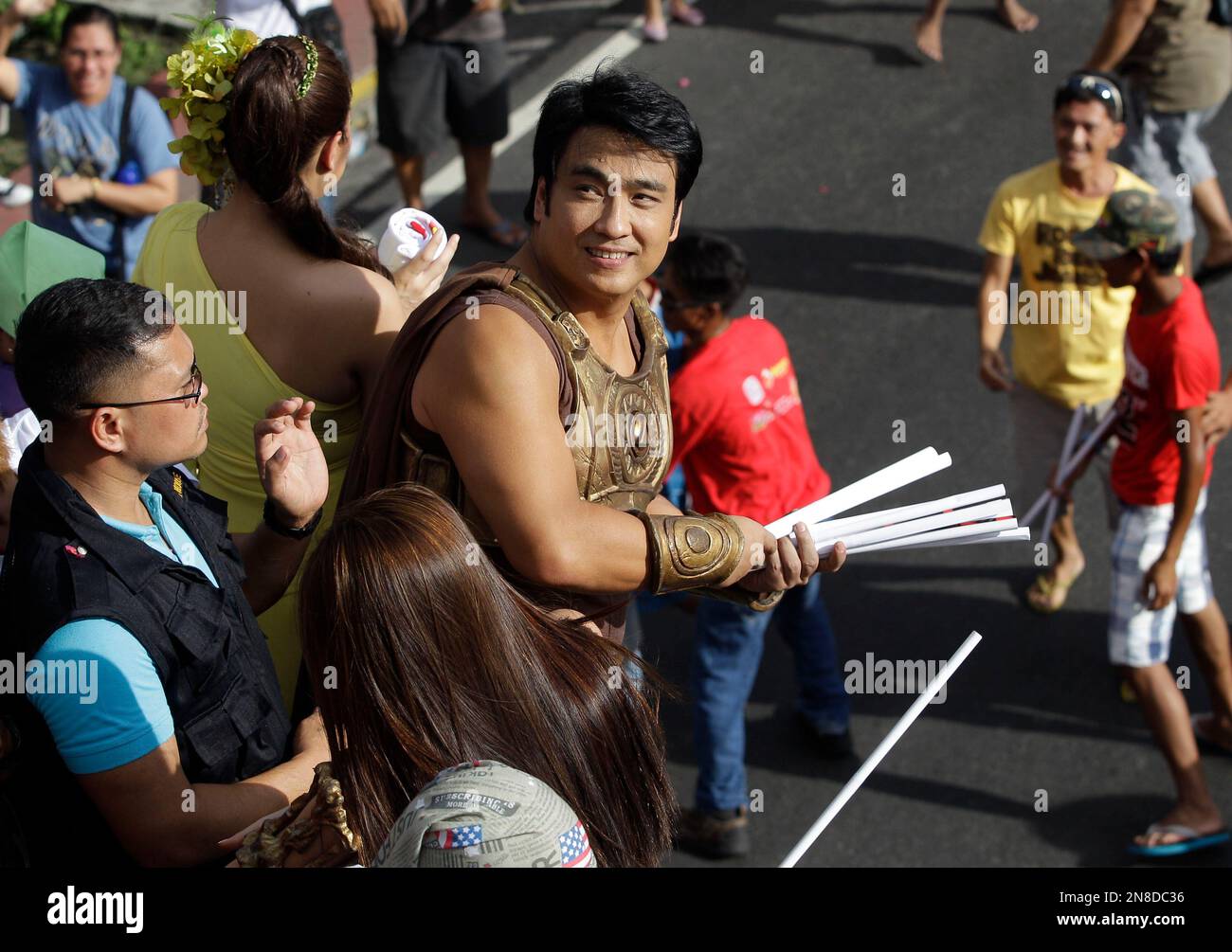 Philippine Senator, actor Ramon "Bong" Revilla, Jr. wears a costume as ...
