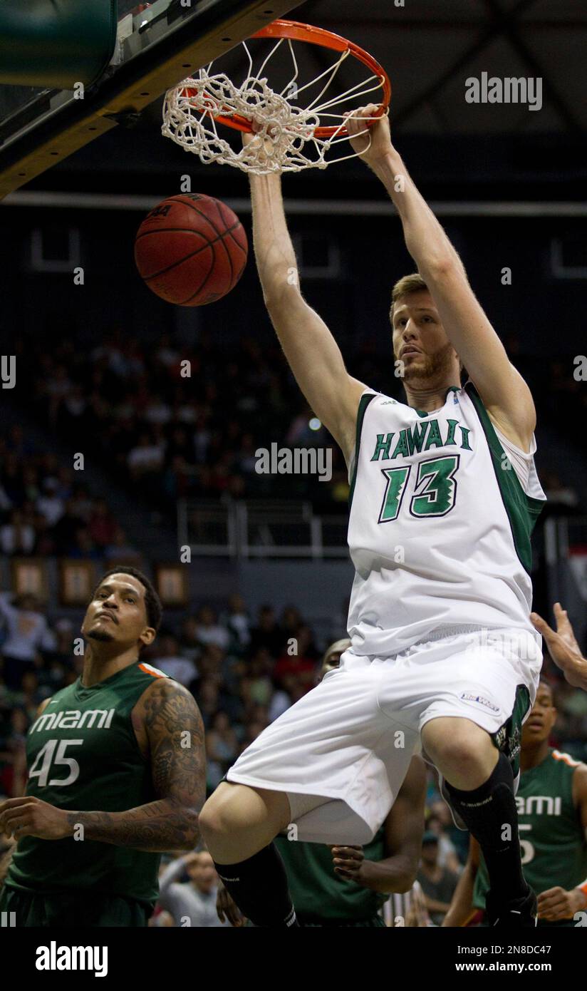 Miami forward Julian Gamble (45) looks on as Hawaii center Davis ...