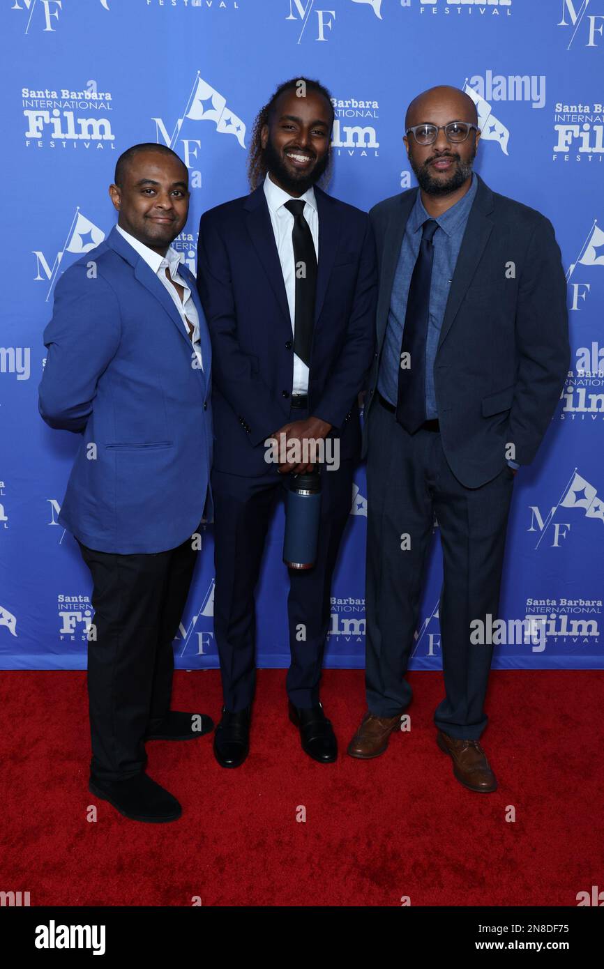 Teferi Seifu, Beyin Abraha, and David Mesfin attend the 22023 Santa ...