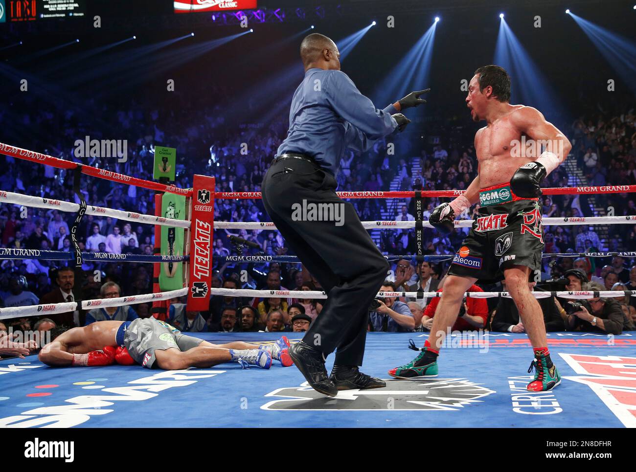 FILE - In this Dec. 8, 2012 file photo, referee Kenny Bayless, center ...