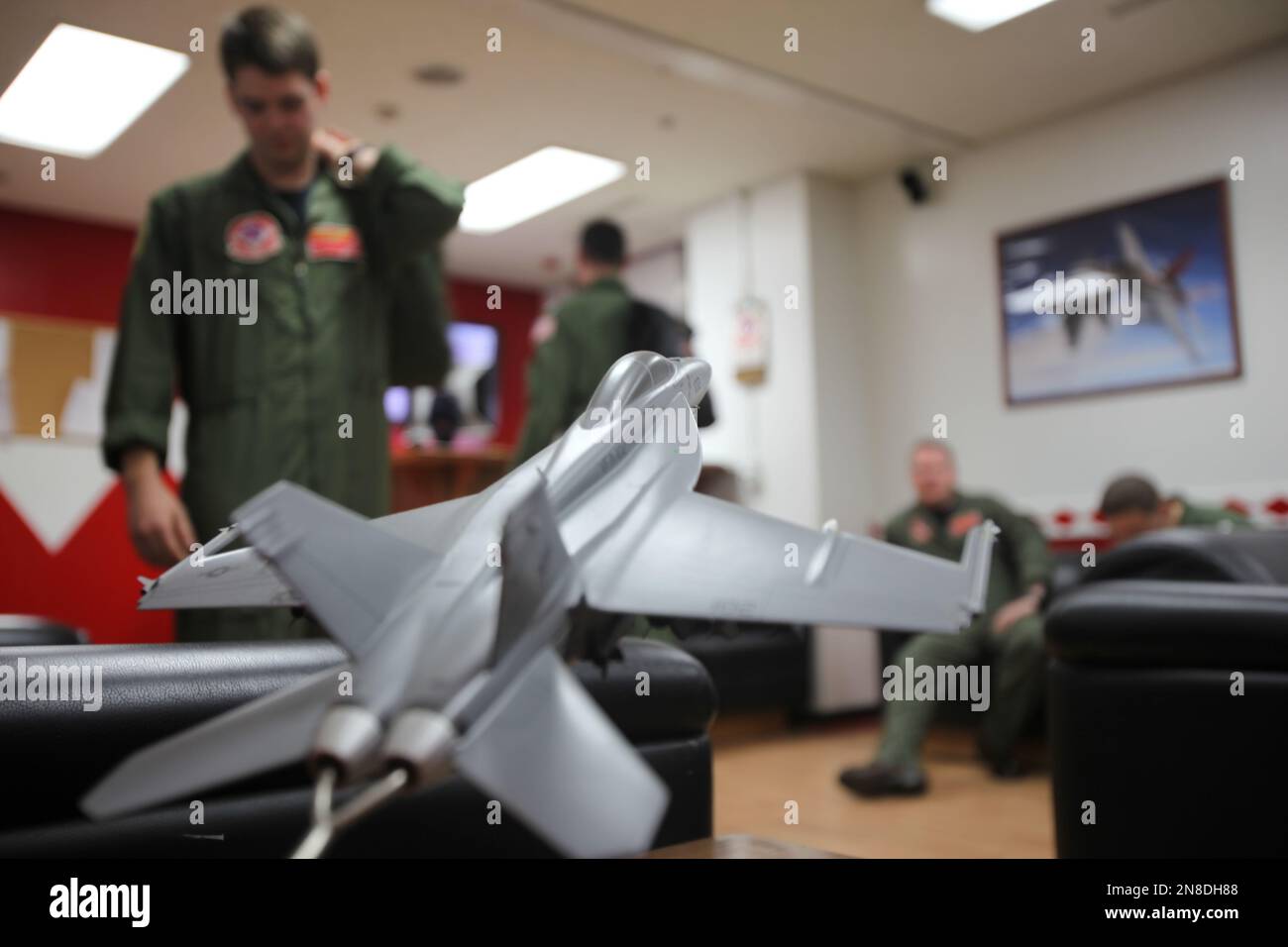 In this photo taken Thursday, Dec. 20, 2012, U.S. Navy pilots with the ...