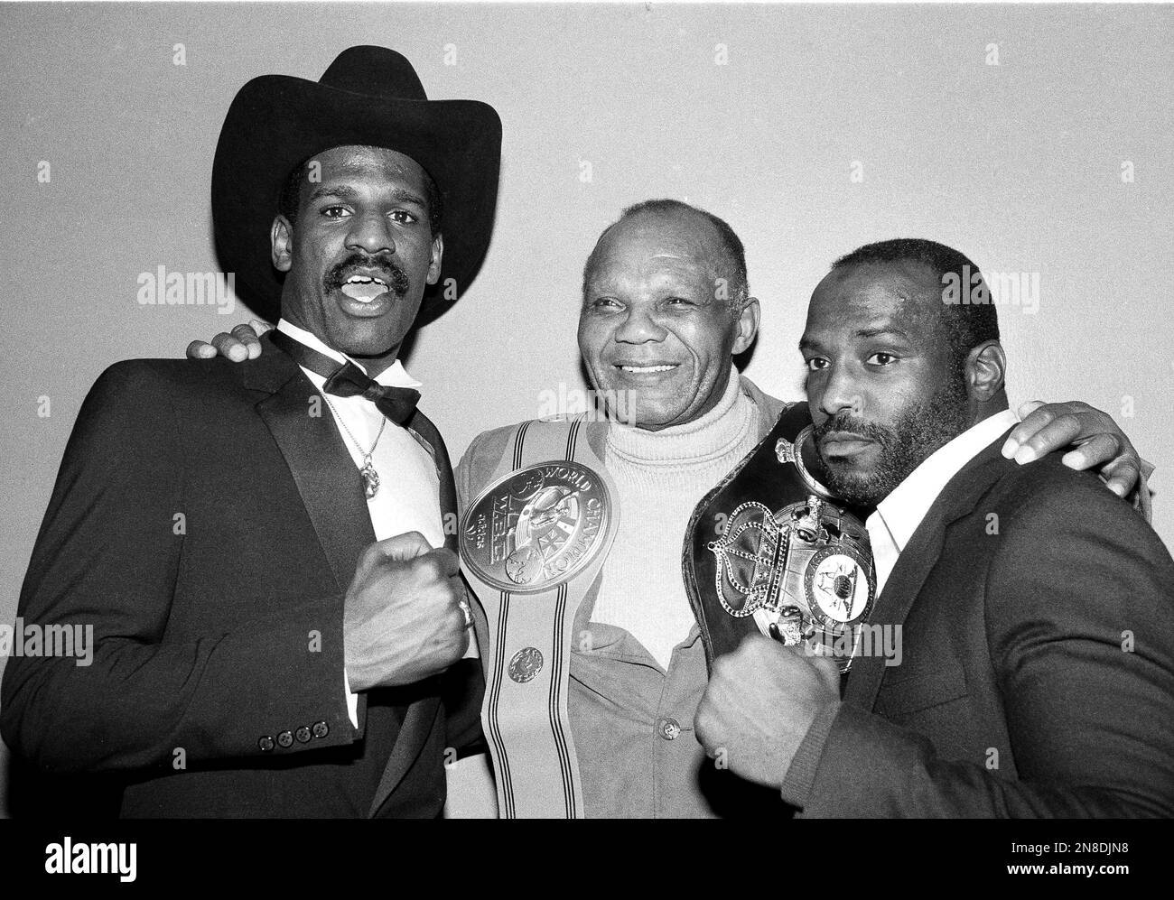 Boxers Michael Spinks, left, and Dwight Braxton, right, pose for the ...